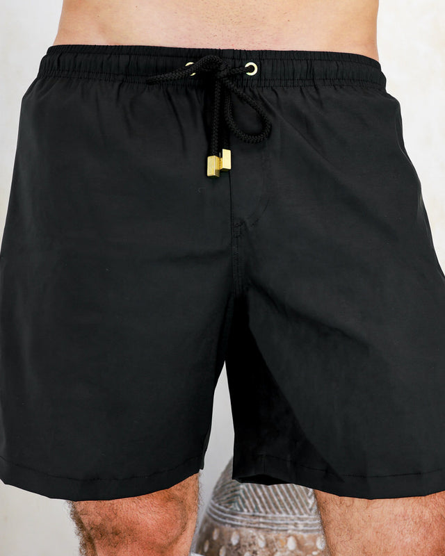 The Midnight Dips | Solid Black Men's Swim Trunks by Kenny Flowers